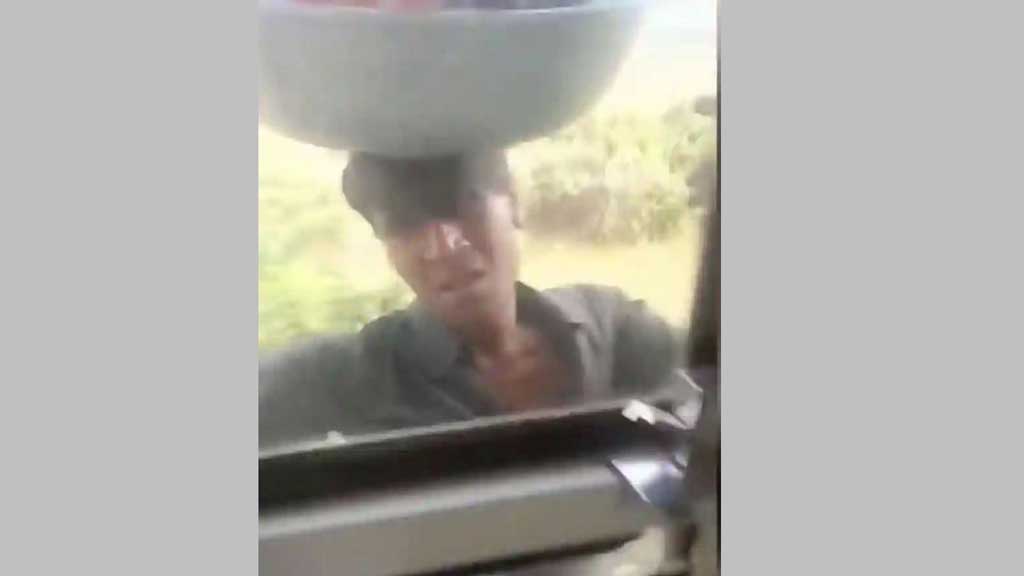 Vendor dangles from moving train, falls but ‘lives’