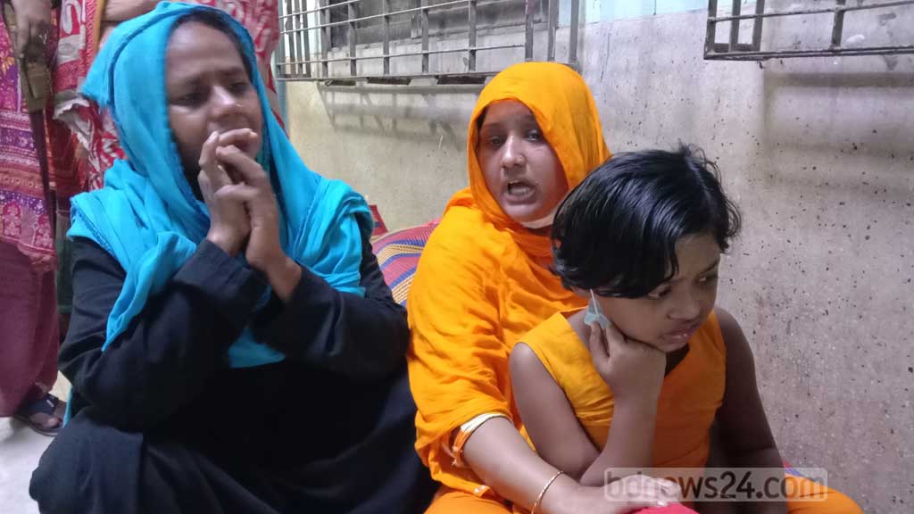 Family of Mokbul, who died in police-BNP clashes in Dhaka, stare at a ...