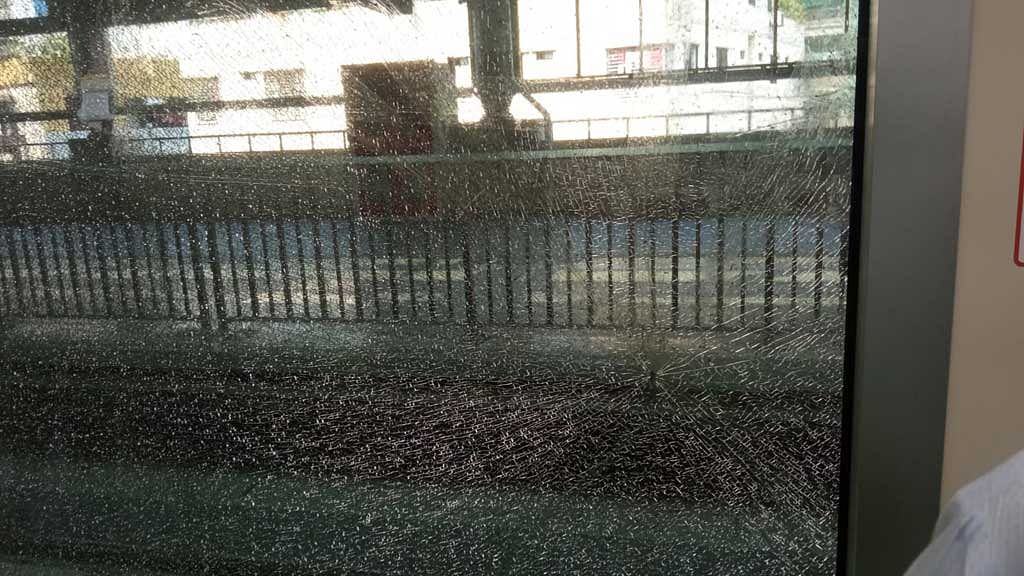 Police to probe as brickbat hit and damages Dhaka metro rail window