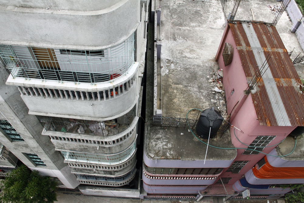 Slanted building being dismantled