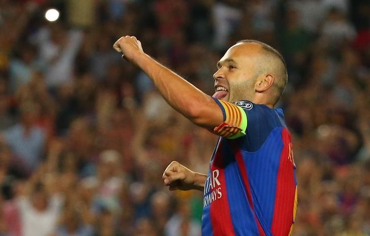 Barcelona captain Iniesta back in training after injury