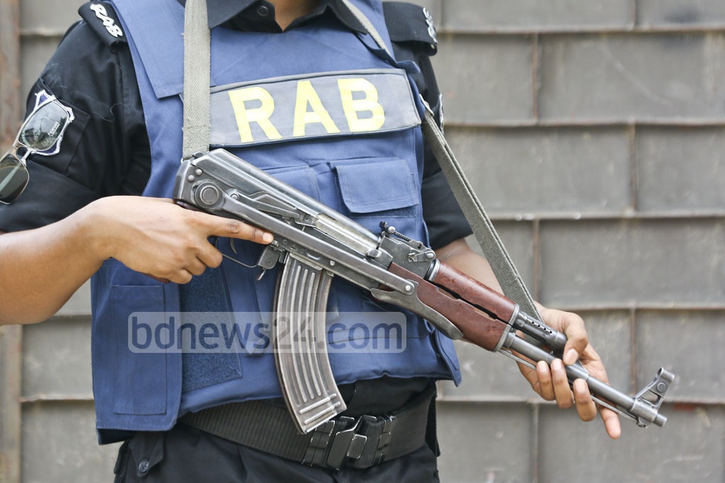 RAB arrests fugitive Kishoreganj war criminal Rajab Ali, who was ...