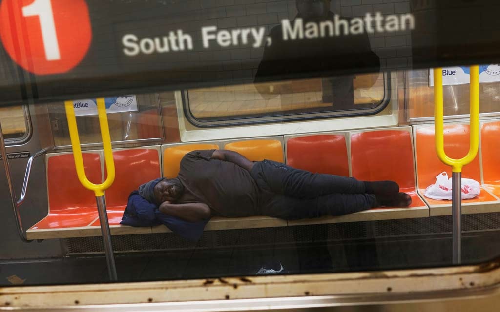 A night on the New York subway: Homeless find shelter underground ...