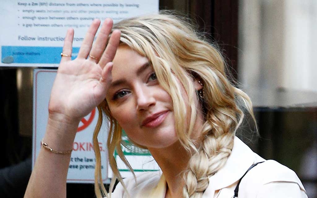 Actress Heard says ex-husband Depp threatened to kill her