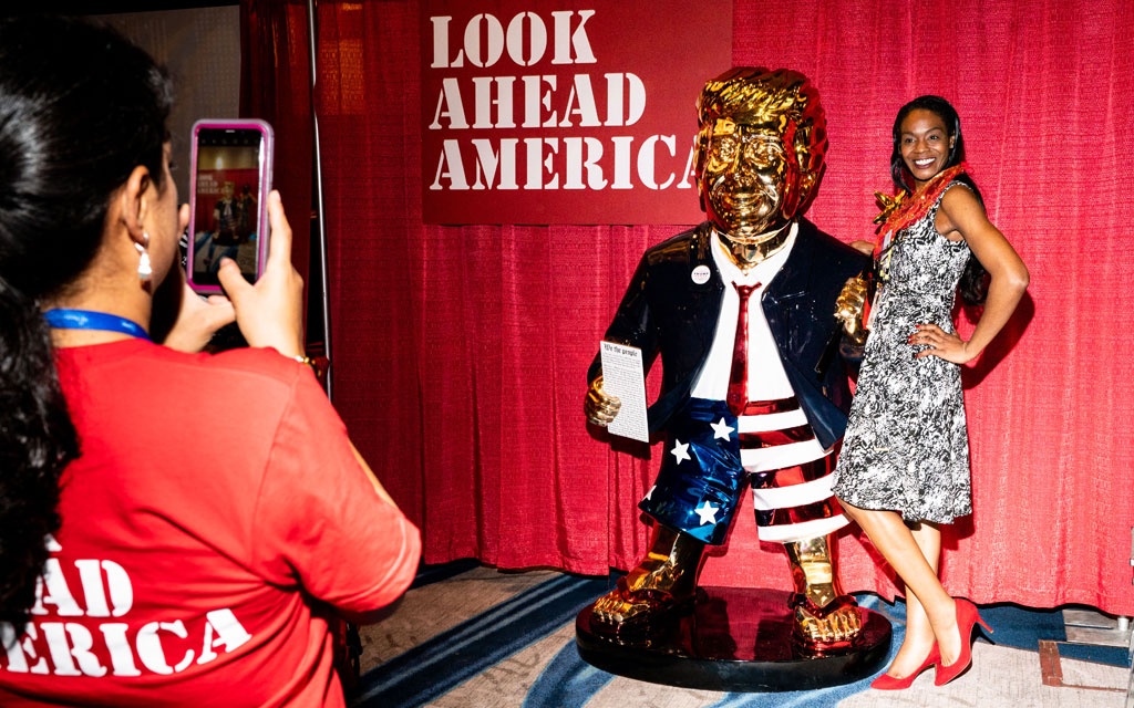 At CPAC, a golden image, a magic wand and reverence for Trump